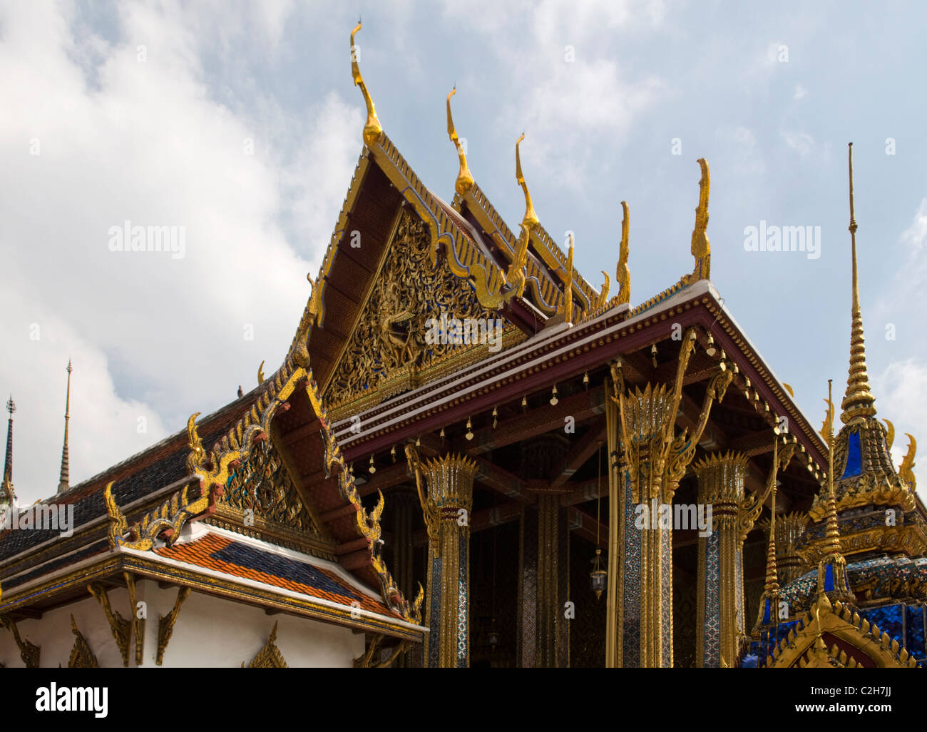 Golden spires and roof design at the Grand Palace complex in Bangkok ...