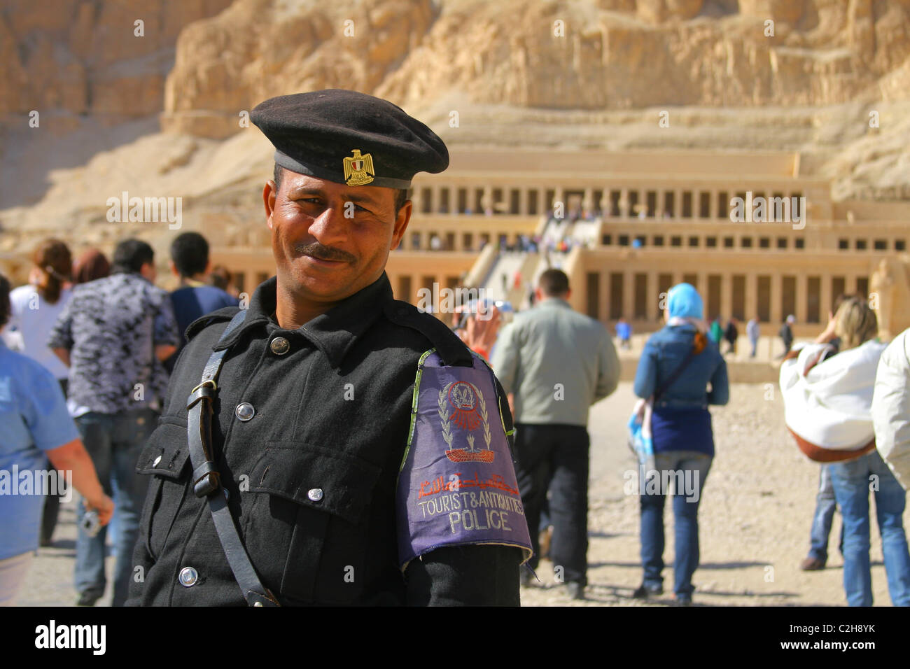 Egyptian policeman (tourist and antiquities police) smiles on the ...