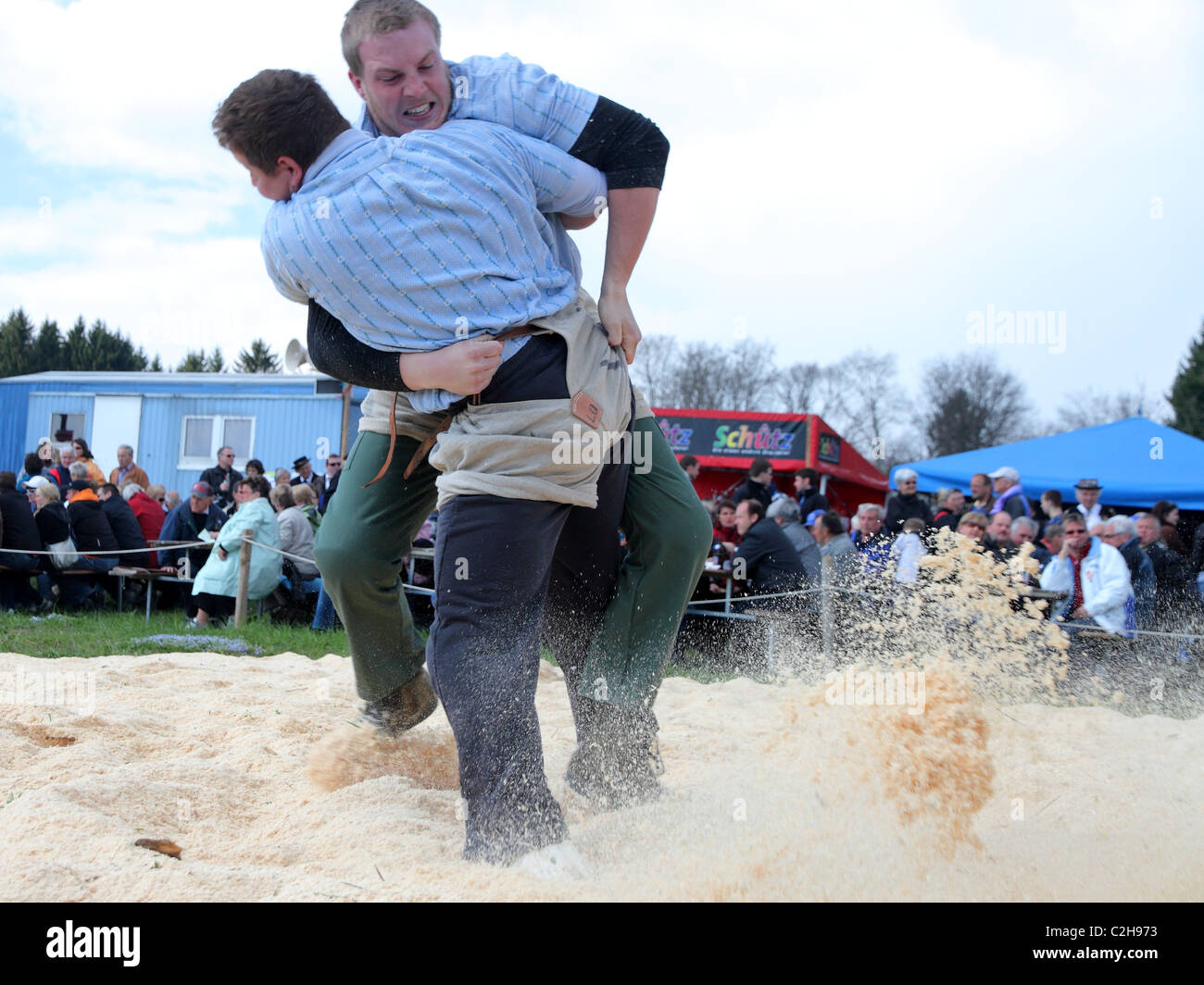 Swiss wrestling athletes fight for victory by throwing their opponent ...