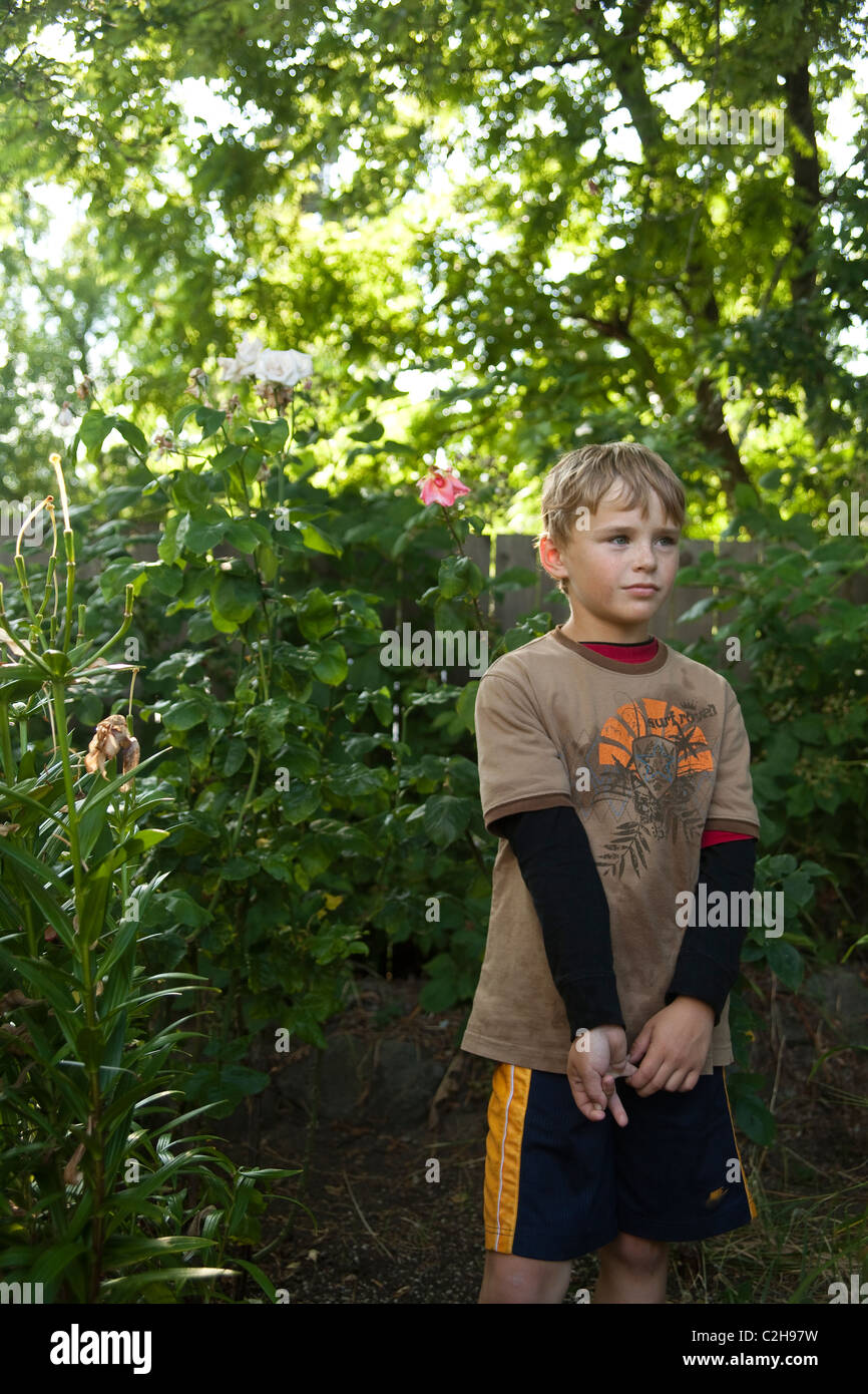 9 Year Old Boy Standing In The Woods Stock Photo Alamy 9-year-old-boy-standing-in-the-woods-stock-photo-alamy