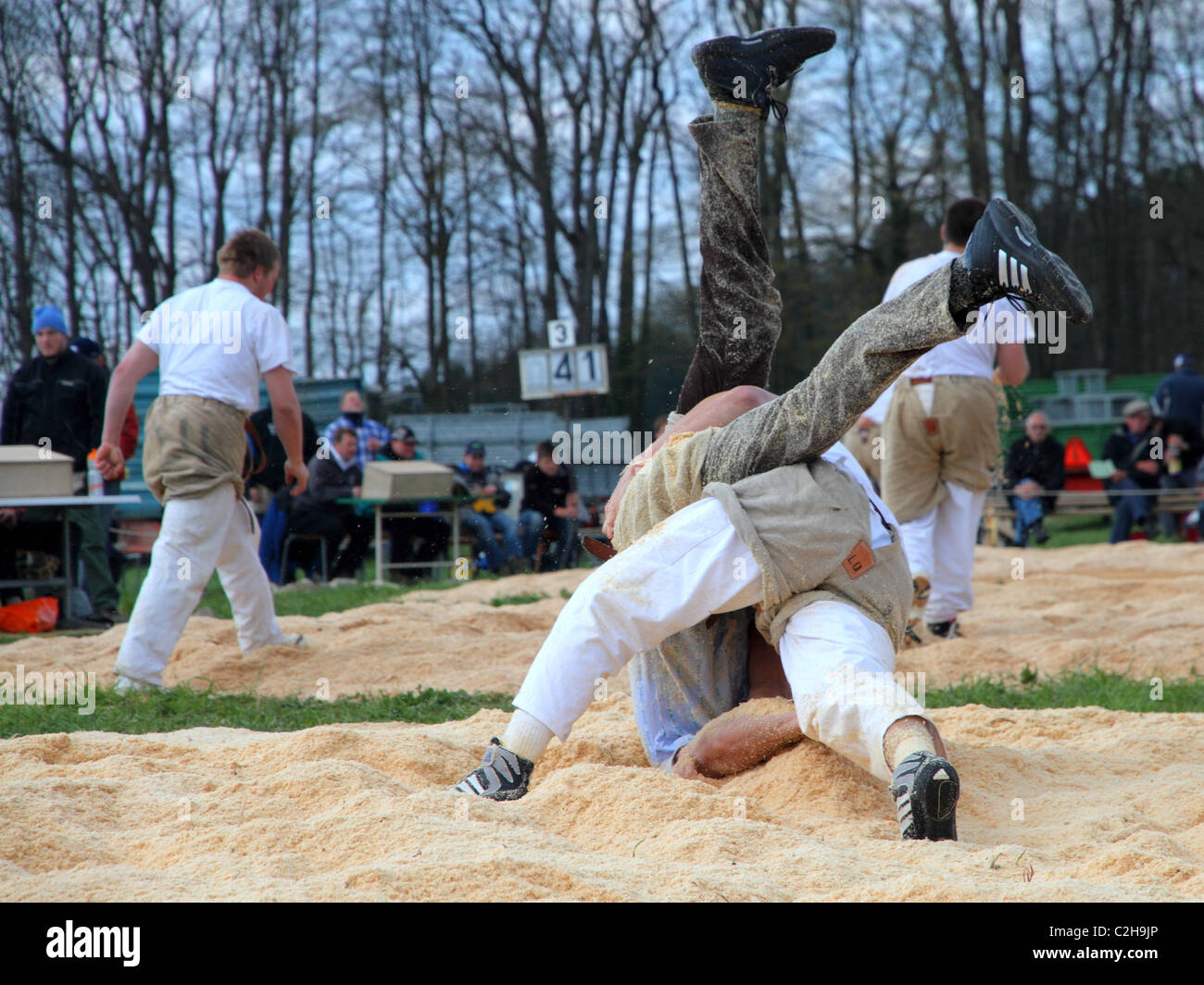 Swiss wrestling athletes fight for victory by throwing their opponent ...