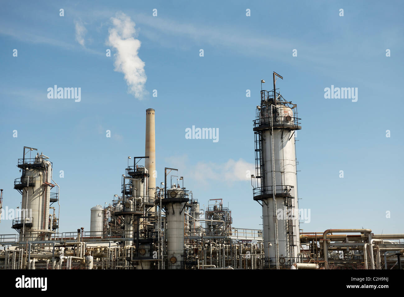 Distillation Tower. Piping and distillation tower in a lubricants ...