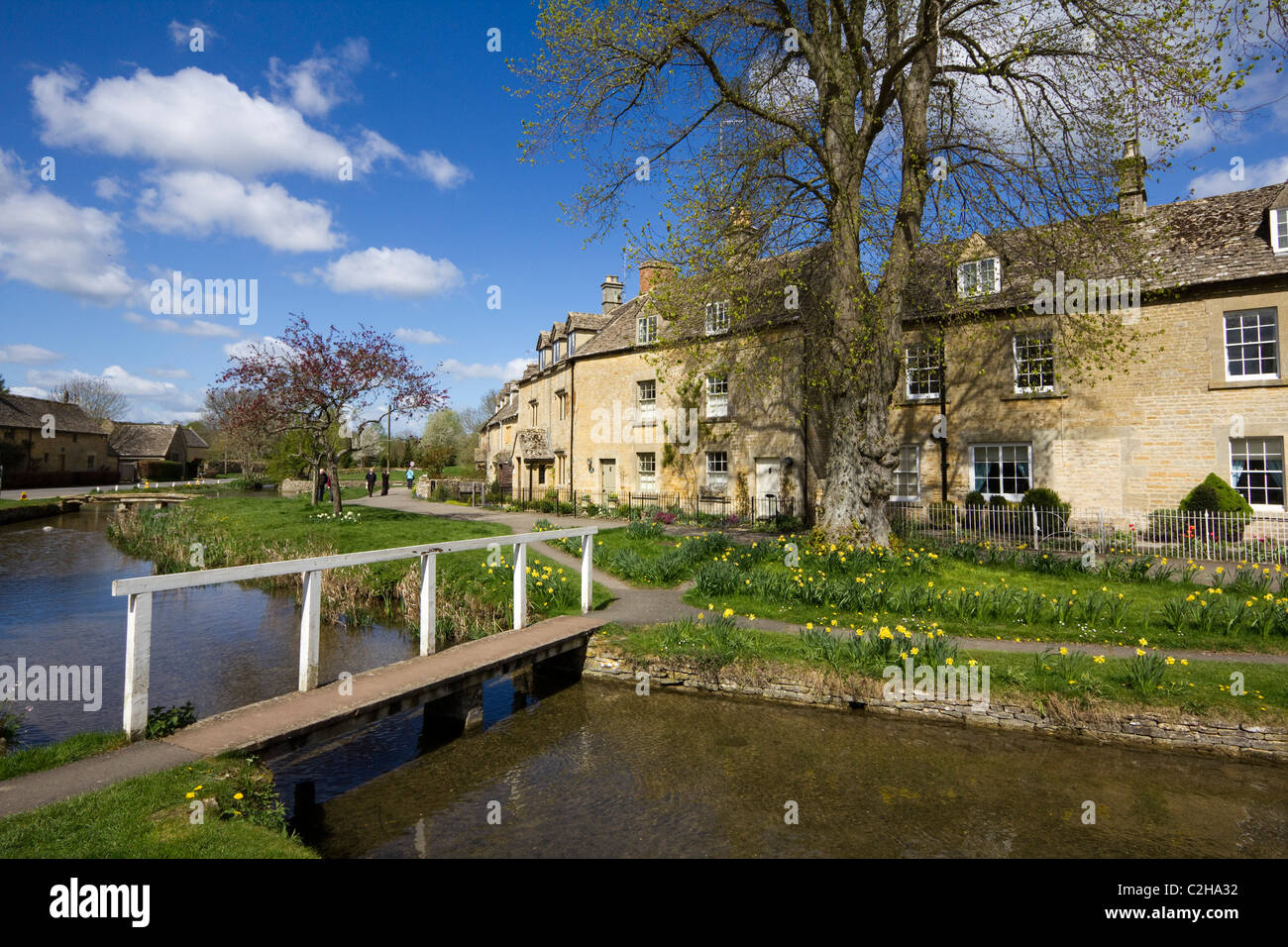 Lower Slaughter village river eye Gloucestershire Cotswolds England ...