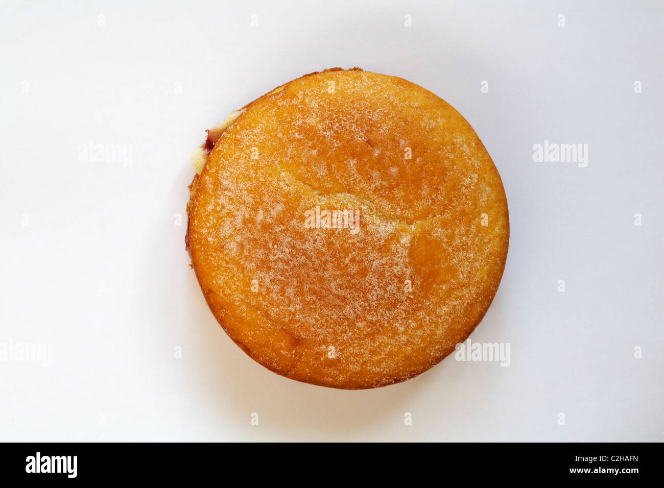 Tesco raspberry jam sponge cake isolated on white background Stock ...