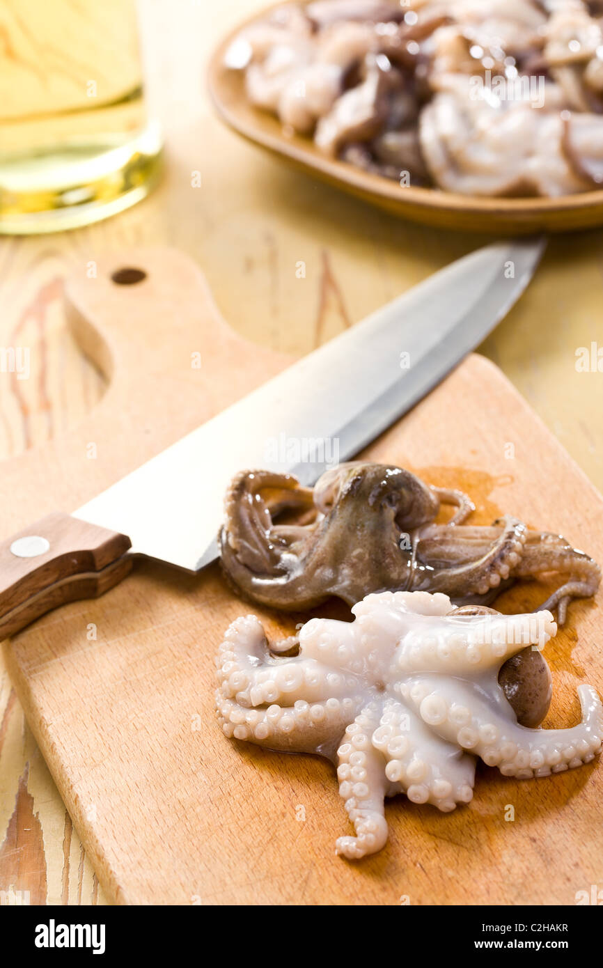 baby octopus on kitchen table Stock Photo - Alamy