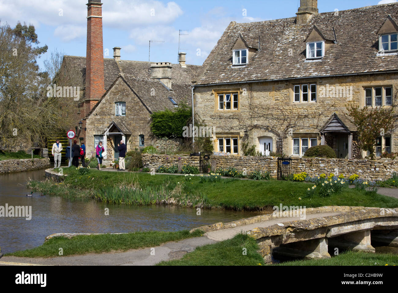 Lower Slaughter village river eye Gloucestershire Cotswolds England ...