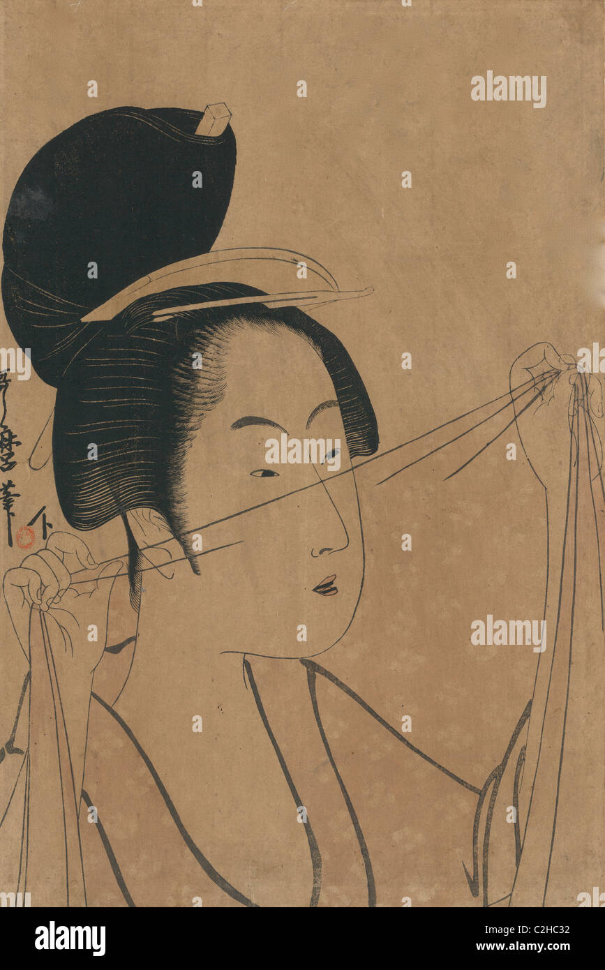 Woman looks thru gossamer silk fabric Stock Photo - Alamy