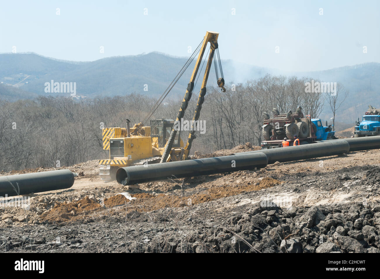 Preparing for pulling the pipeline through a water barrier Stock Photo ...