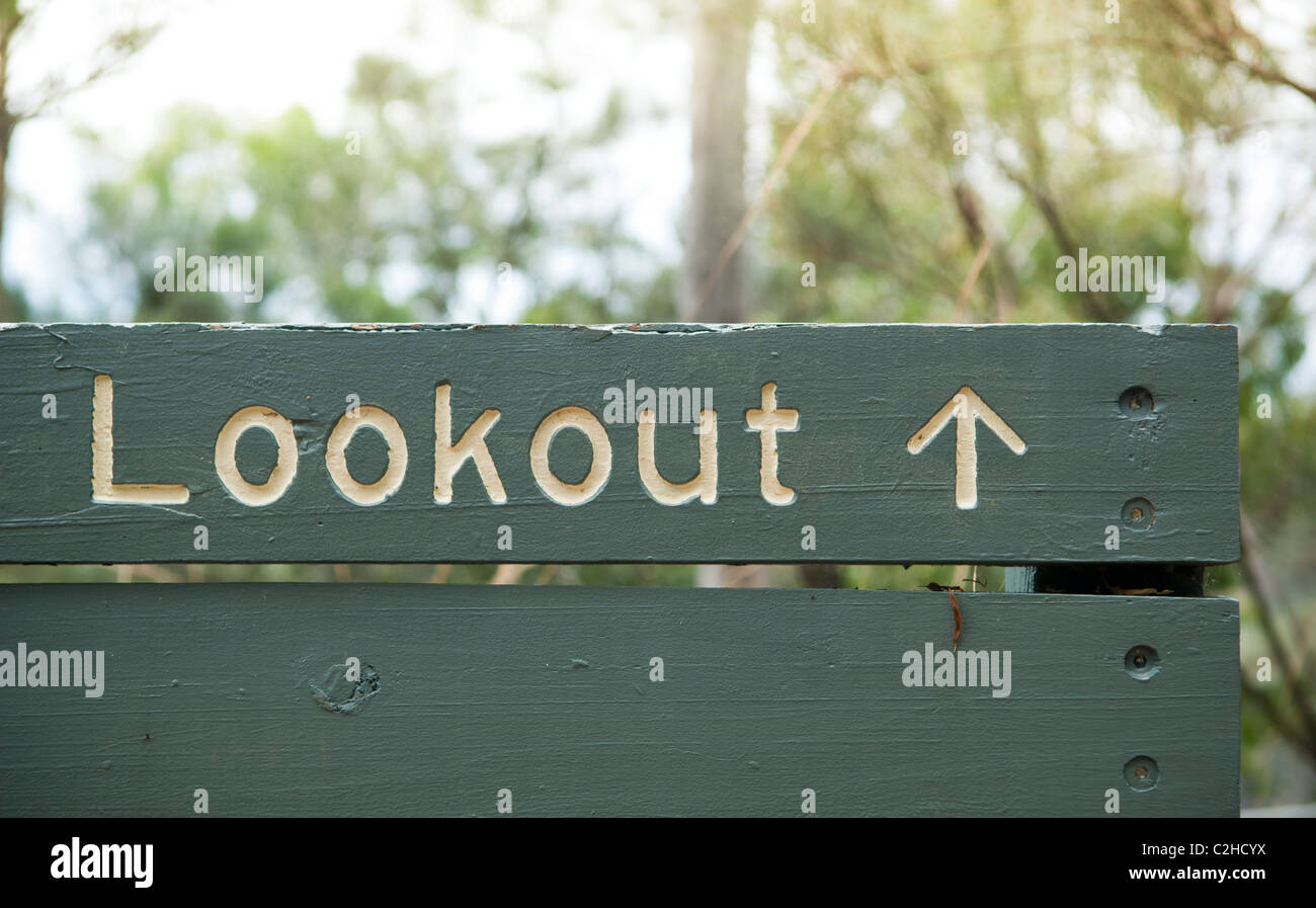 Green wooden sign points towards a lookout Stock Photo - Alamy