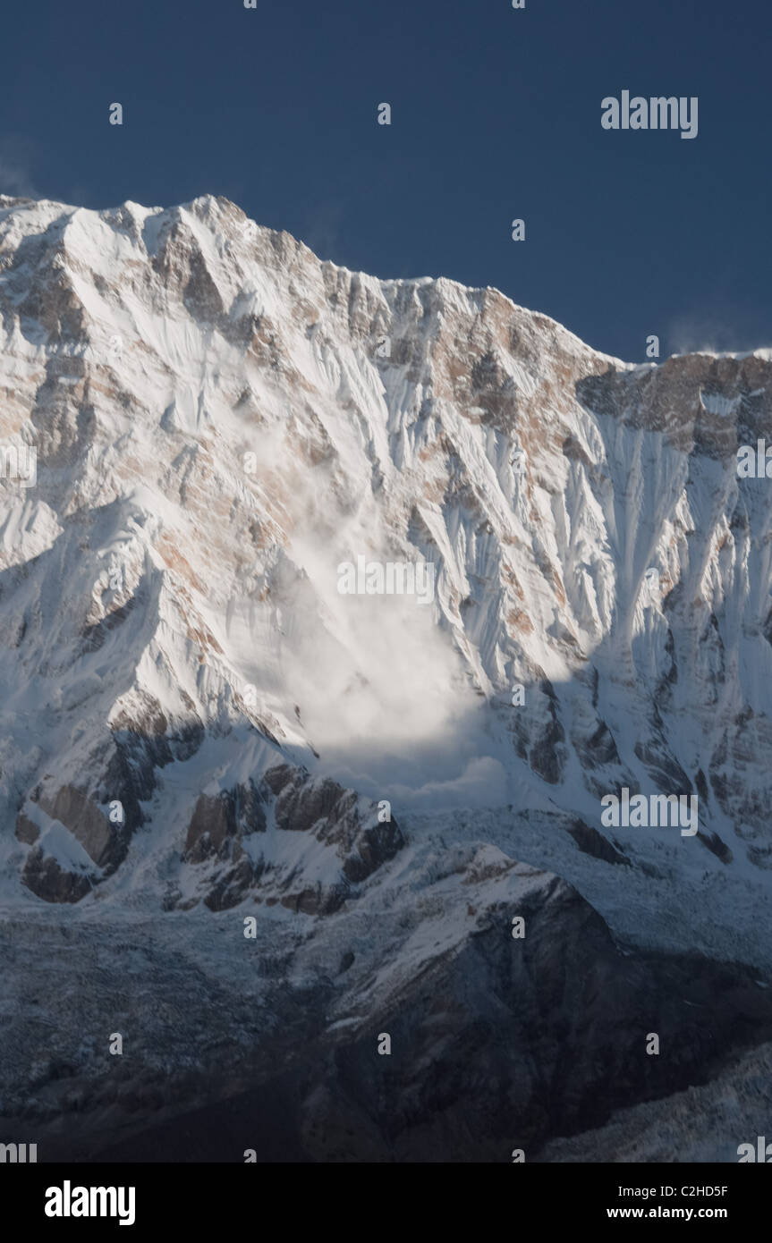 Avalanche falling on the Annapurna mountain range Stock Photo - Alamy