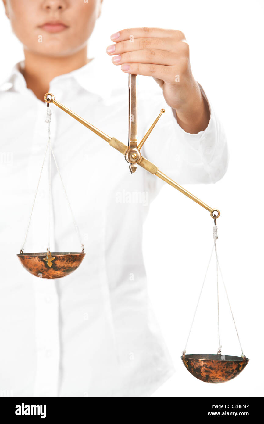 Young judge holding scales in isolation Stock Photo - Alamy