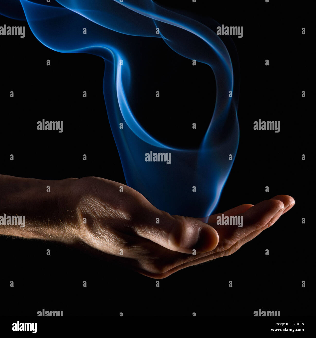 Smoke Wisps From A Hand Stock Photo - Alamy