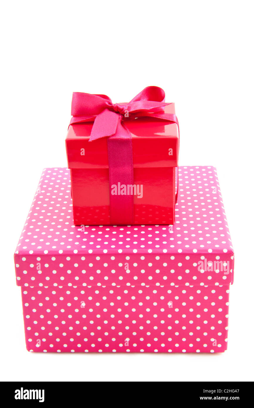 Two colorful gift boxes isolated over white Stock Photo - Alamy