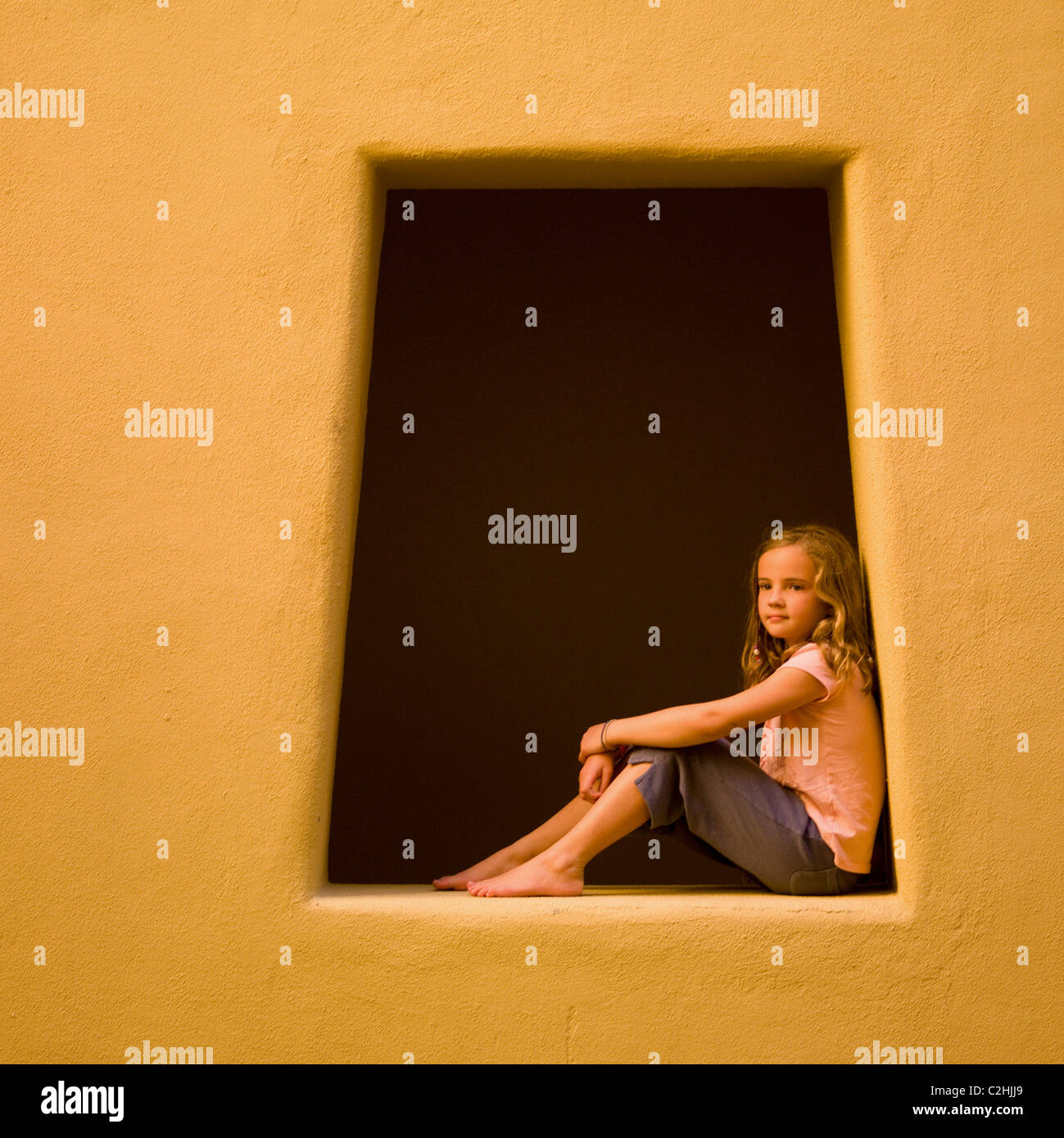 People sitting in window sills hi-res stock photography and images - Alamy