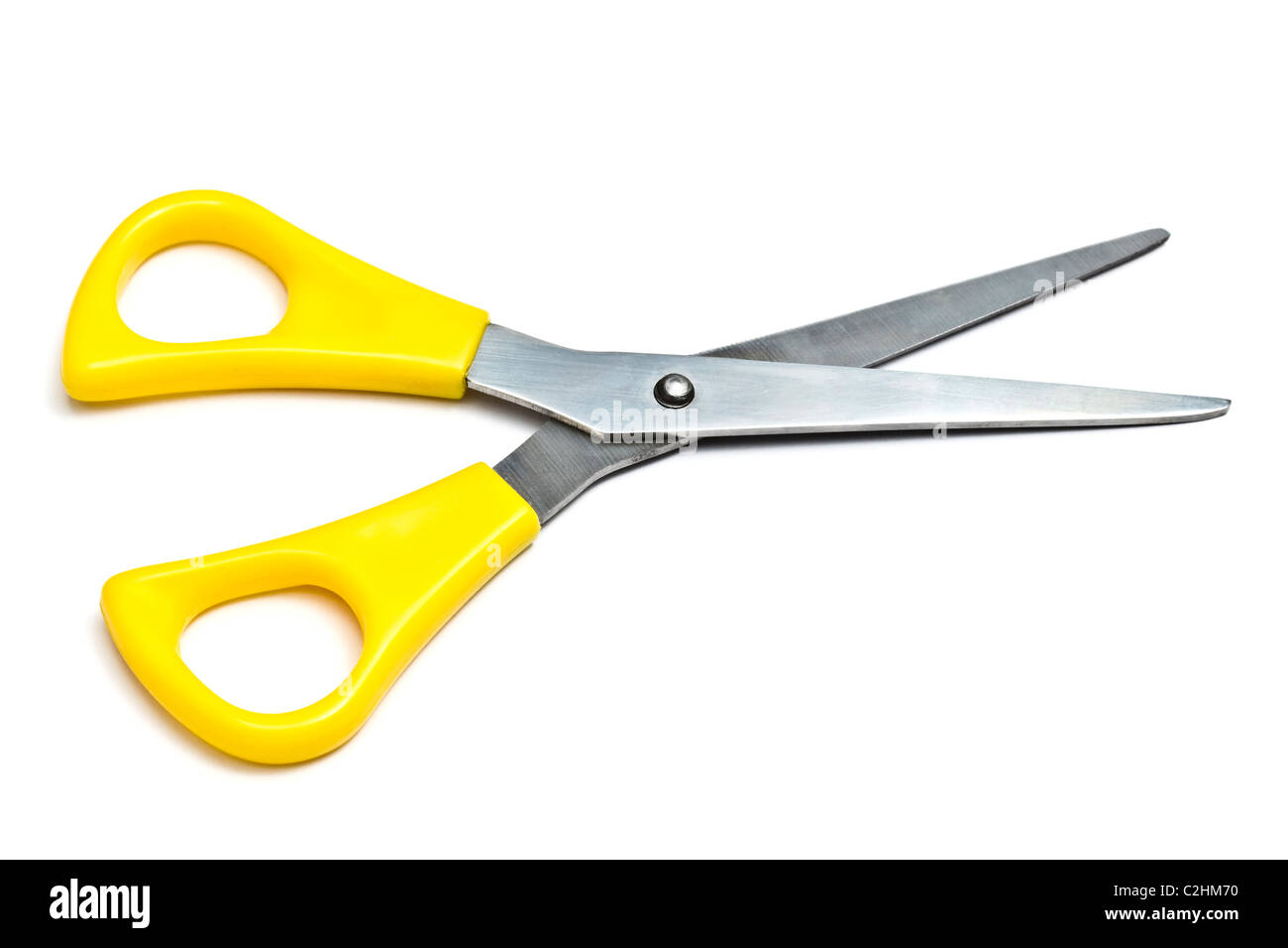 Yellow handled scissors closeup on a white background Stock Photo - Alamy