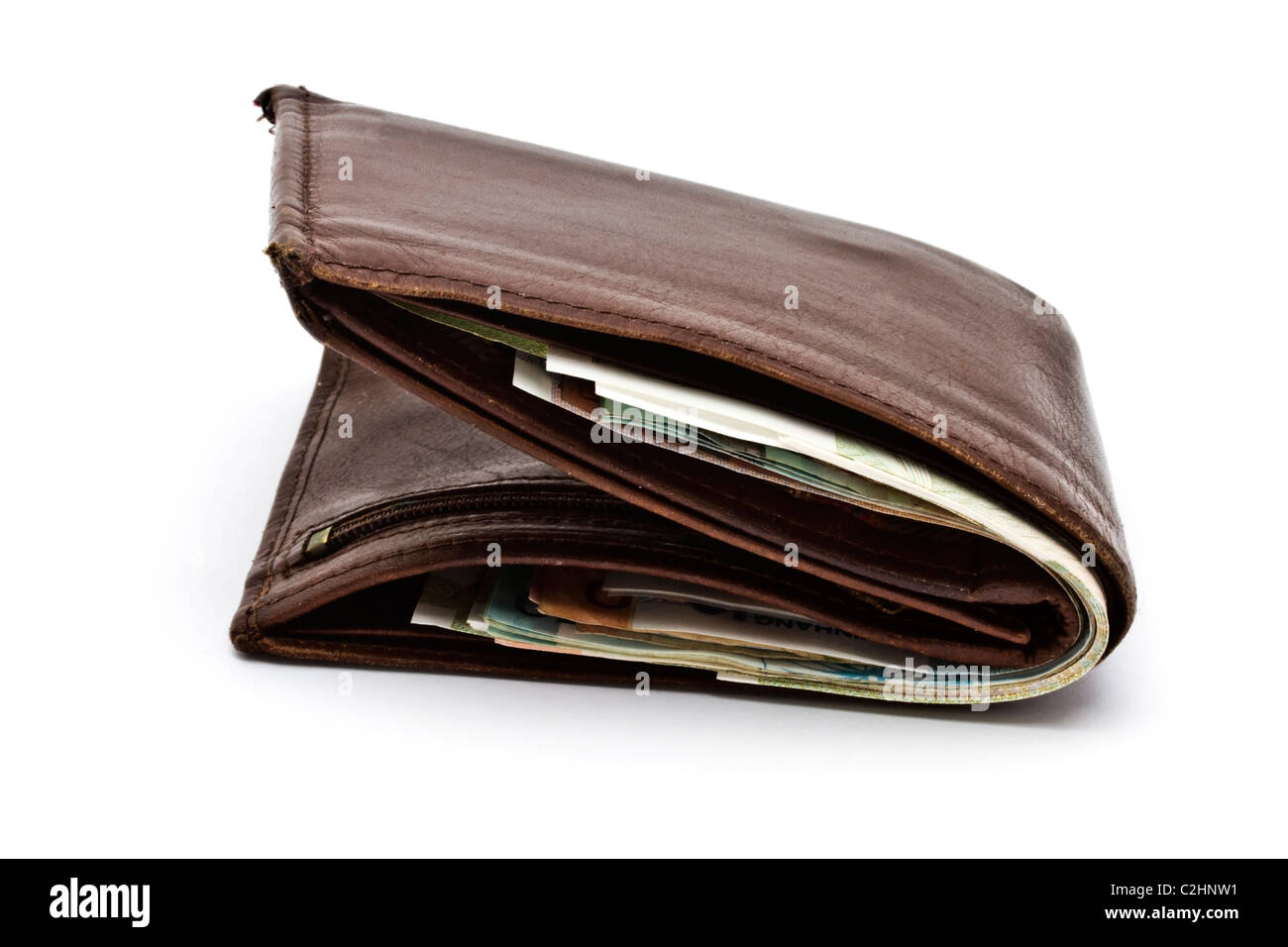 Old wallet and currency closeup on white background Stock Photo - Alamy