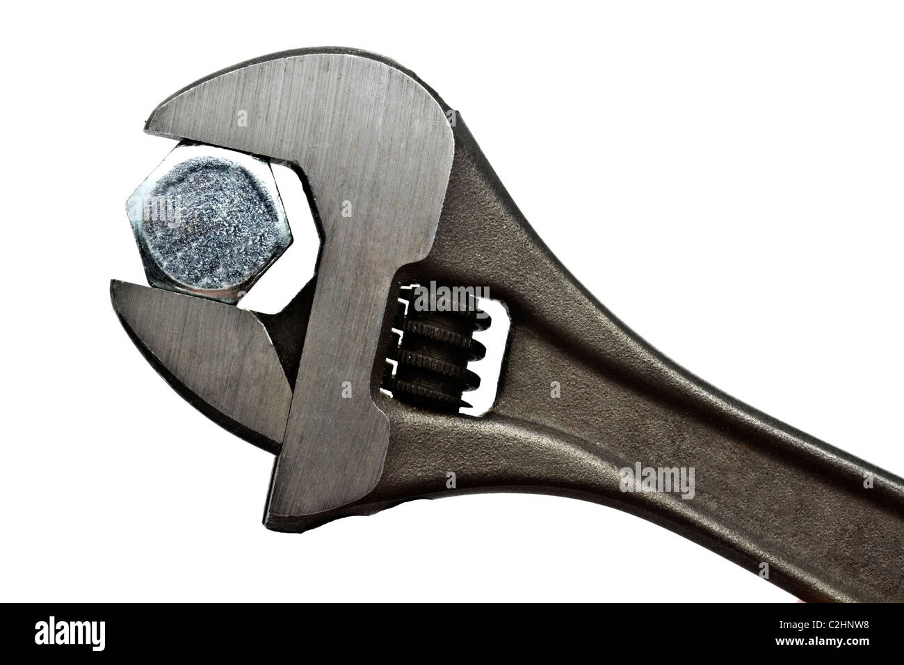Adjustable wrench and bolt isolated on white background Stock Photo - Alamy
