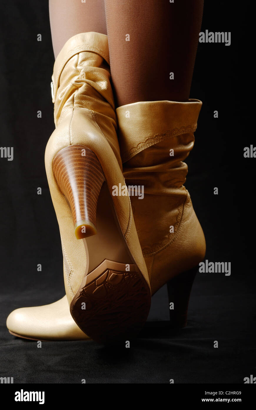 pair of leather women's shoe on feet Stock Photo - Alamy