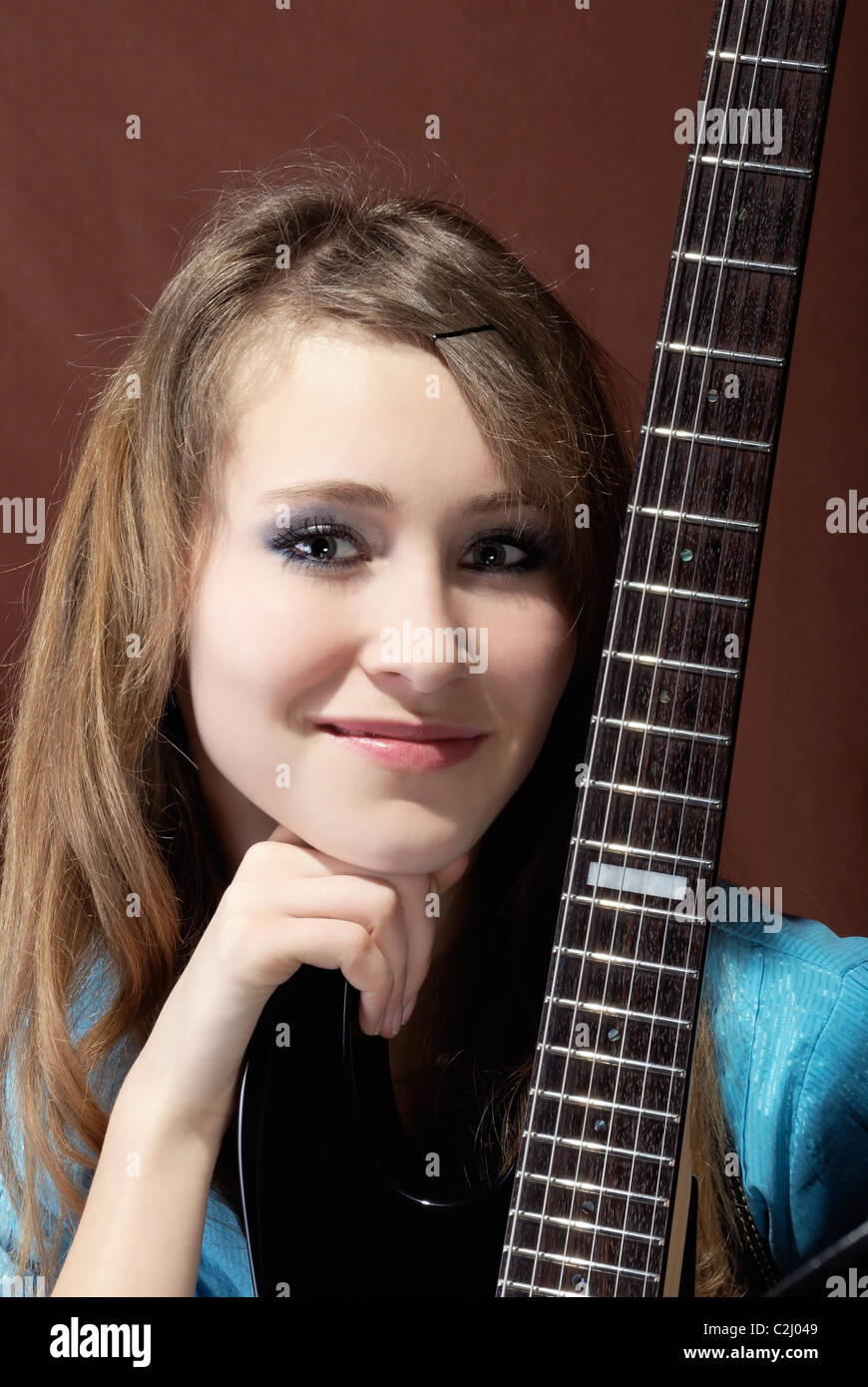 attractive girl with guitar. portrait Stock Photo - Alamy