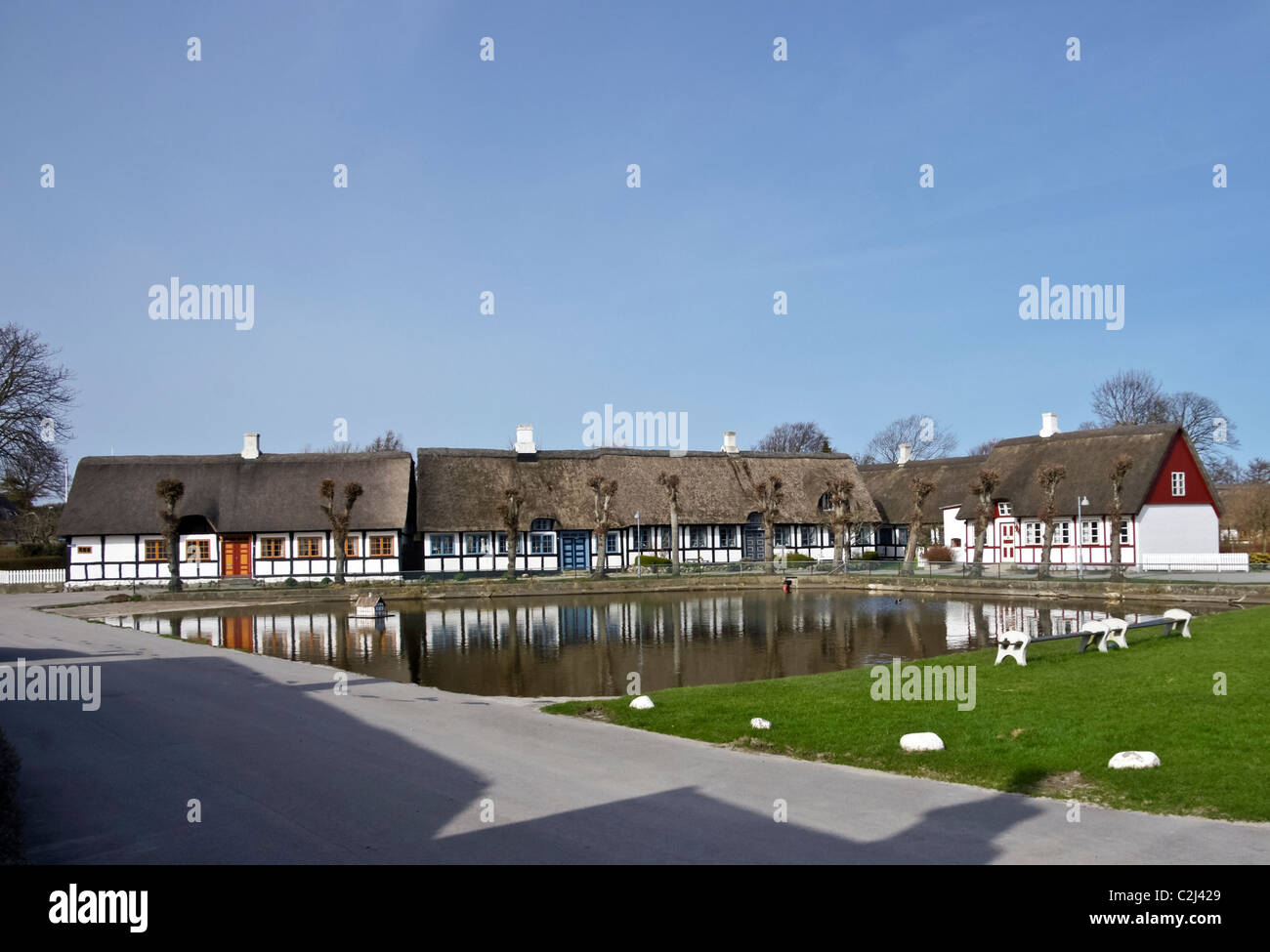 View of attractive thatched houses in Danish town Nordby on island ...