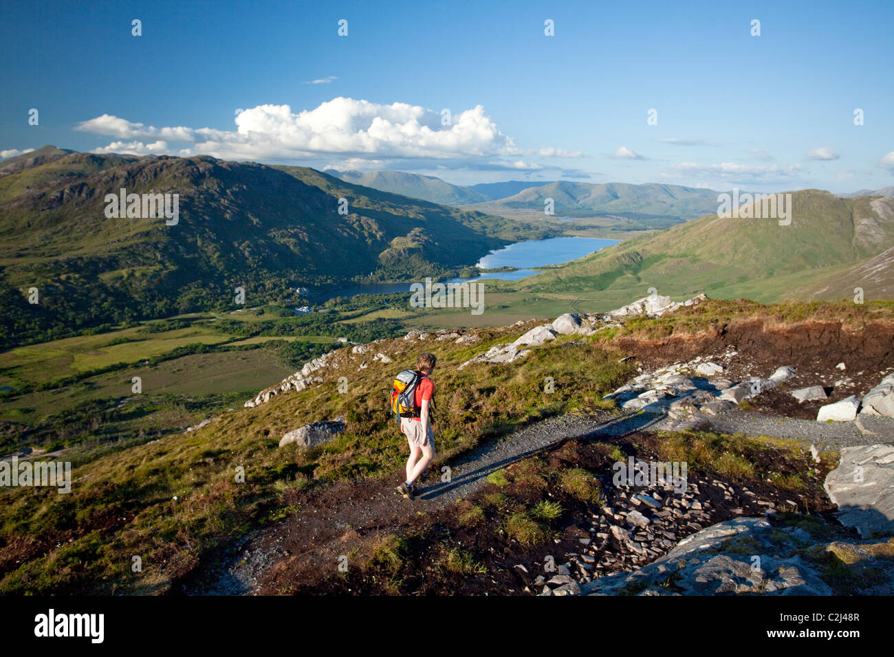 Hilker climbing Diamond Hill, in the Twelve Ben Mountains. Connemara ...