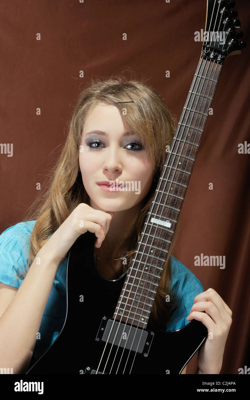 attractive girl with guitar. portrait Stock Photo - Alamy