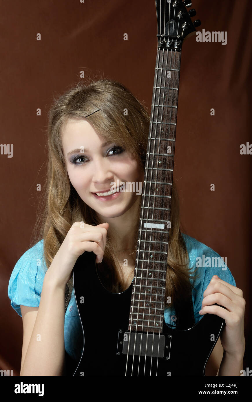 attractive girl with guitar. portrait Stock Photo - Alamy
