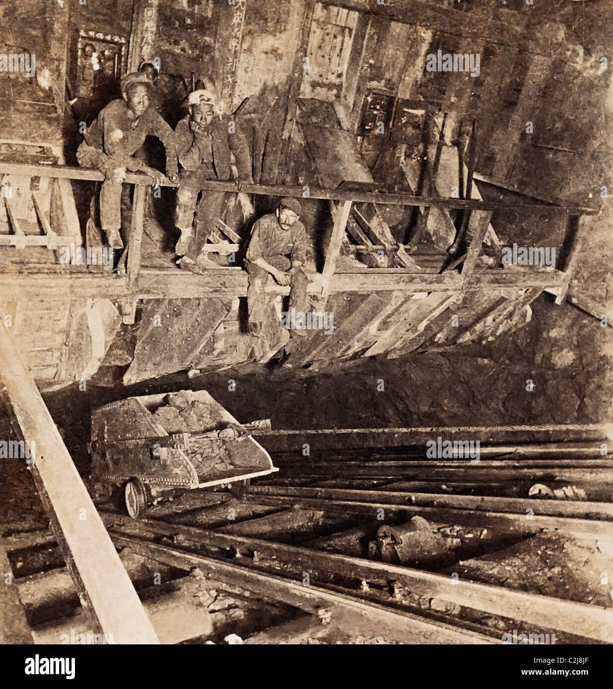 Miners loading a skip with ore in Cason Gold Mine Transvaal South ...