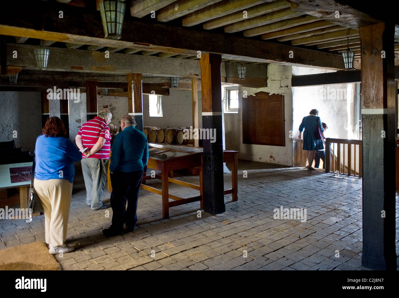 Tourists inside the Gunpowder Magazine at Upnor Castle. Photograph by ...