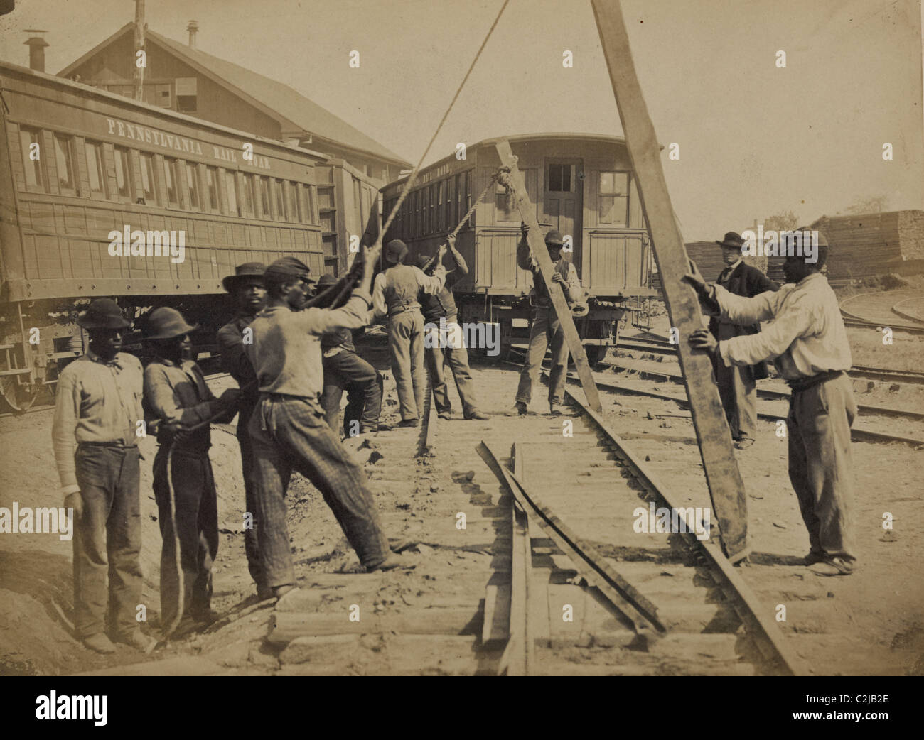 Military railroad operations in northern Virginia: men using levers for ...