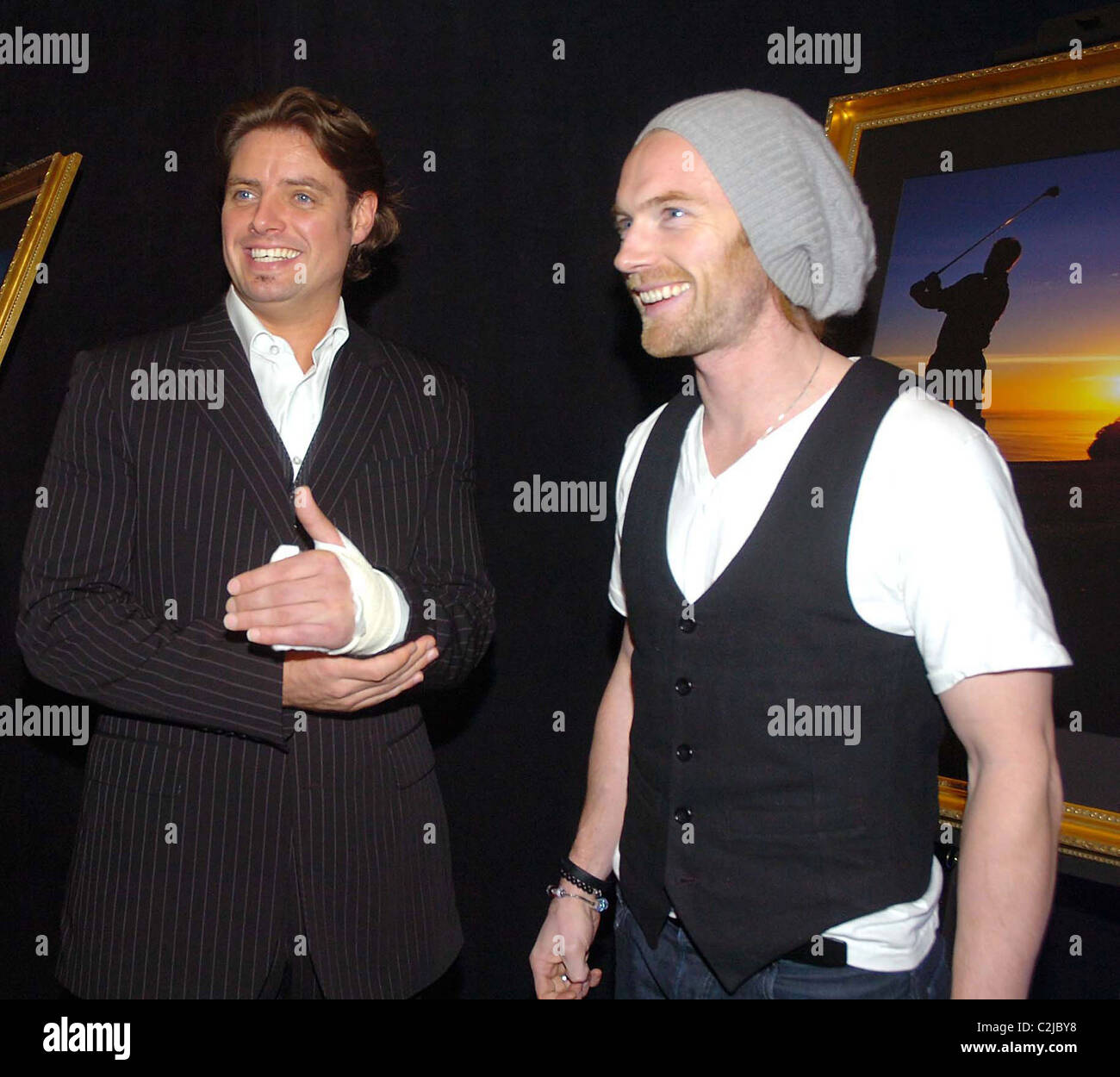 Keith Duffy shows off his broken hand to Boyzone bandmate Ronan Keating ...