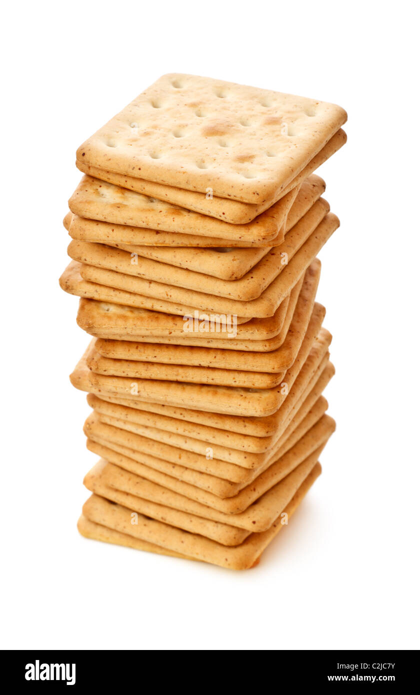 salty crackers pile isolated on white background Stock Photo - Alamy