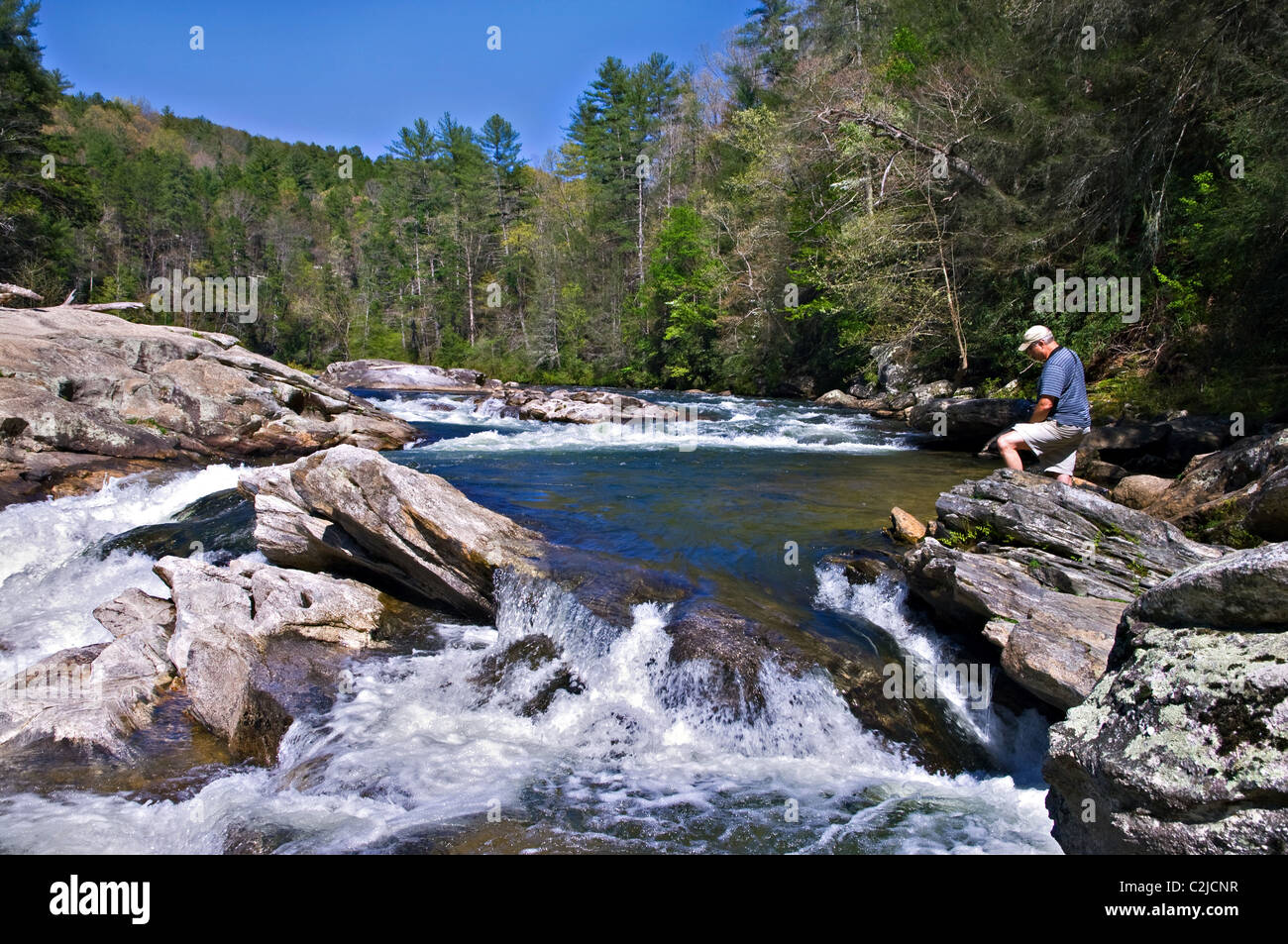 Man standing by a river hi-res stock photography and images - Alamy