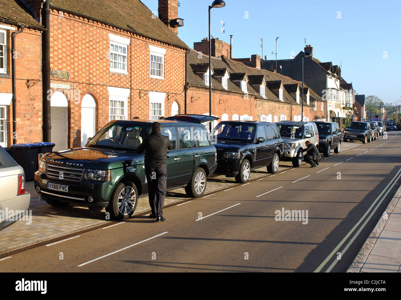 Range Rover cars parked in a street Stock Photo - Alamy