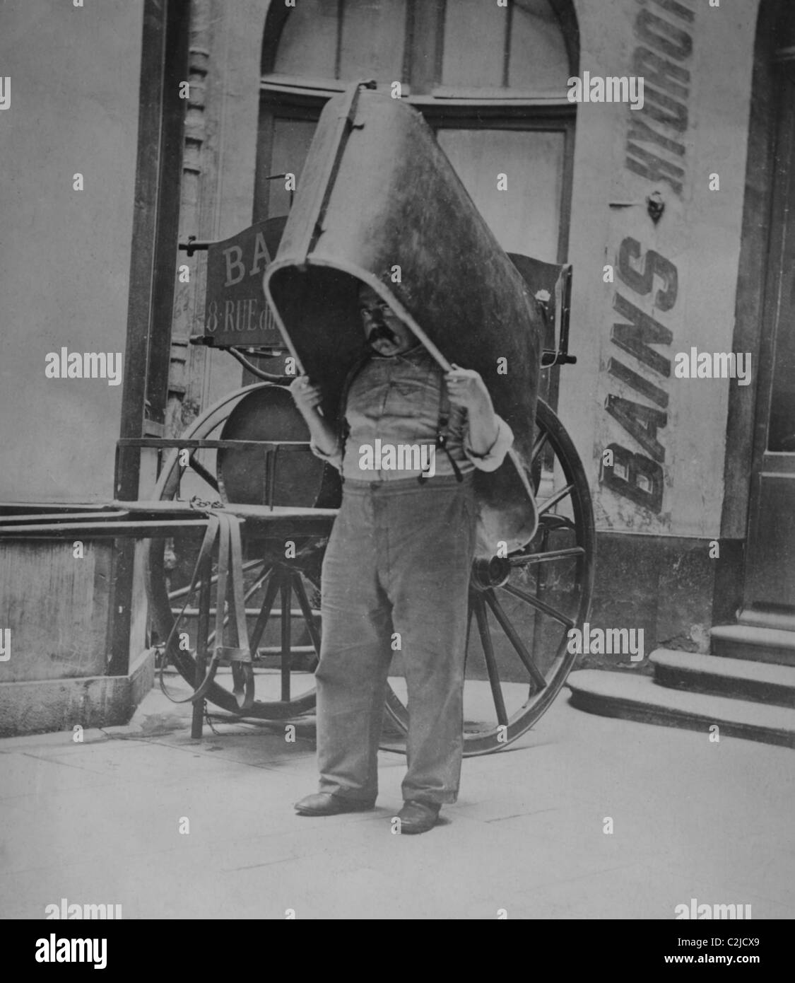 Biplane with spinning propeller is towed down Fifth Avenue New York for ...