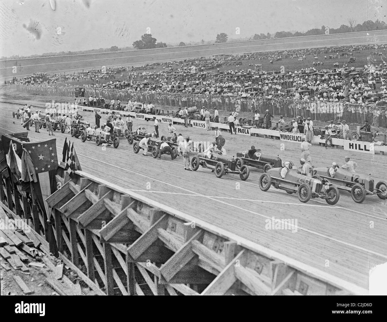 Auto racers at Speedway line up at starting line to begin the race ...
