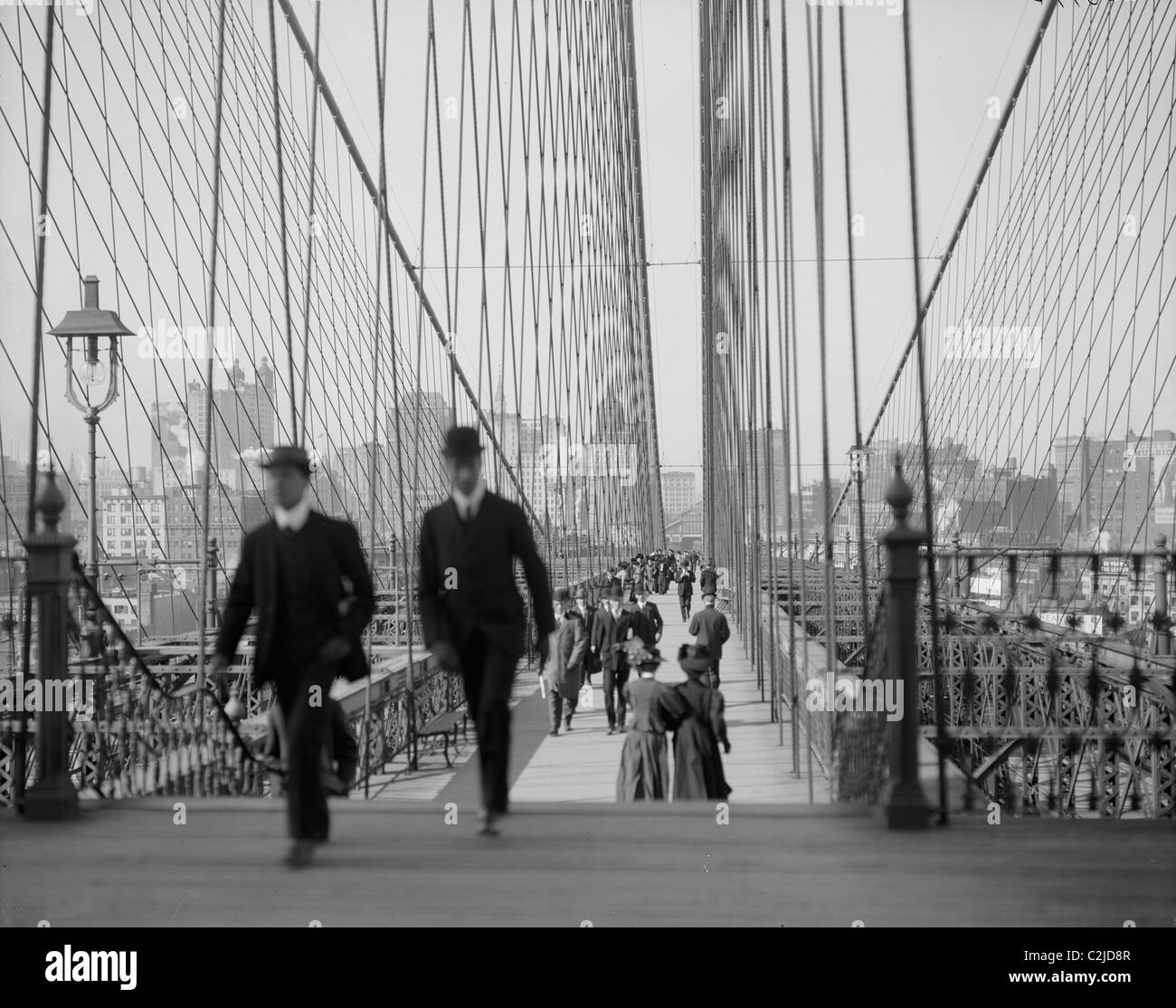 Pedestrians Cross the Brooklyn Bridge Stock Photo - Alamy