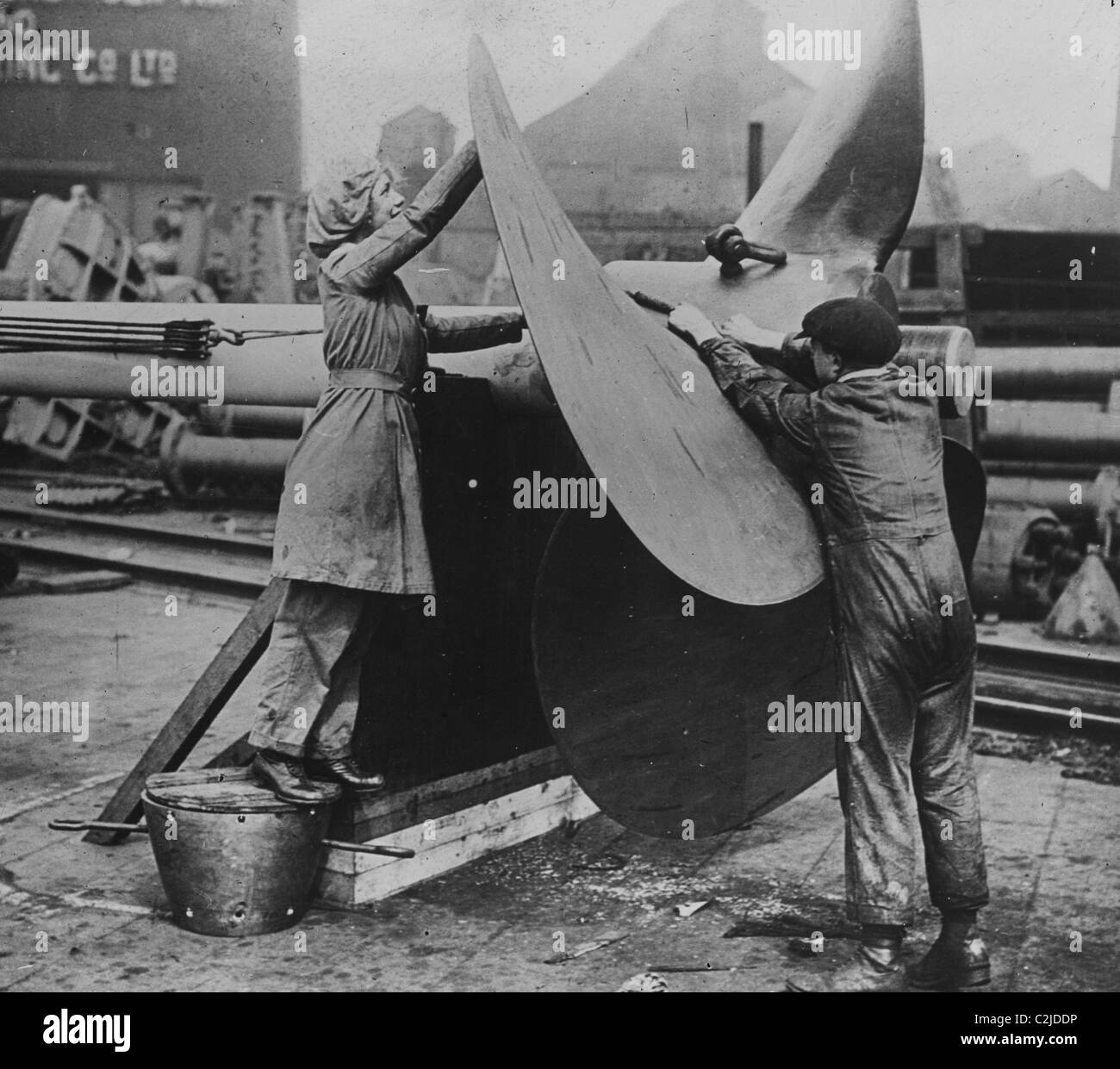 English Workers labor over a ship's Propeller at Shipyard Stock Photo ...