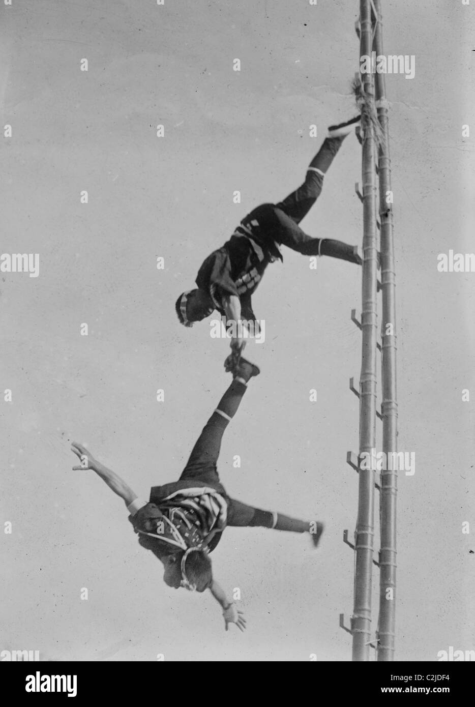 Two Tokyo Firefighters display acrobatic skill on very high bamboo ...