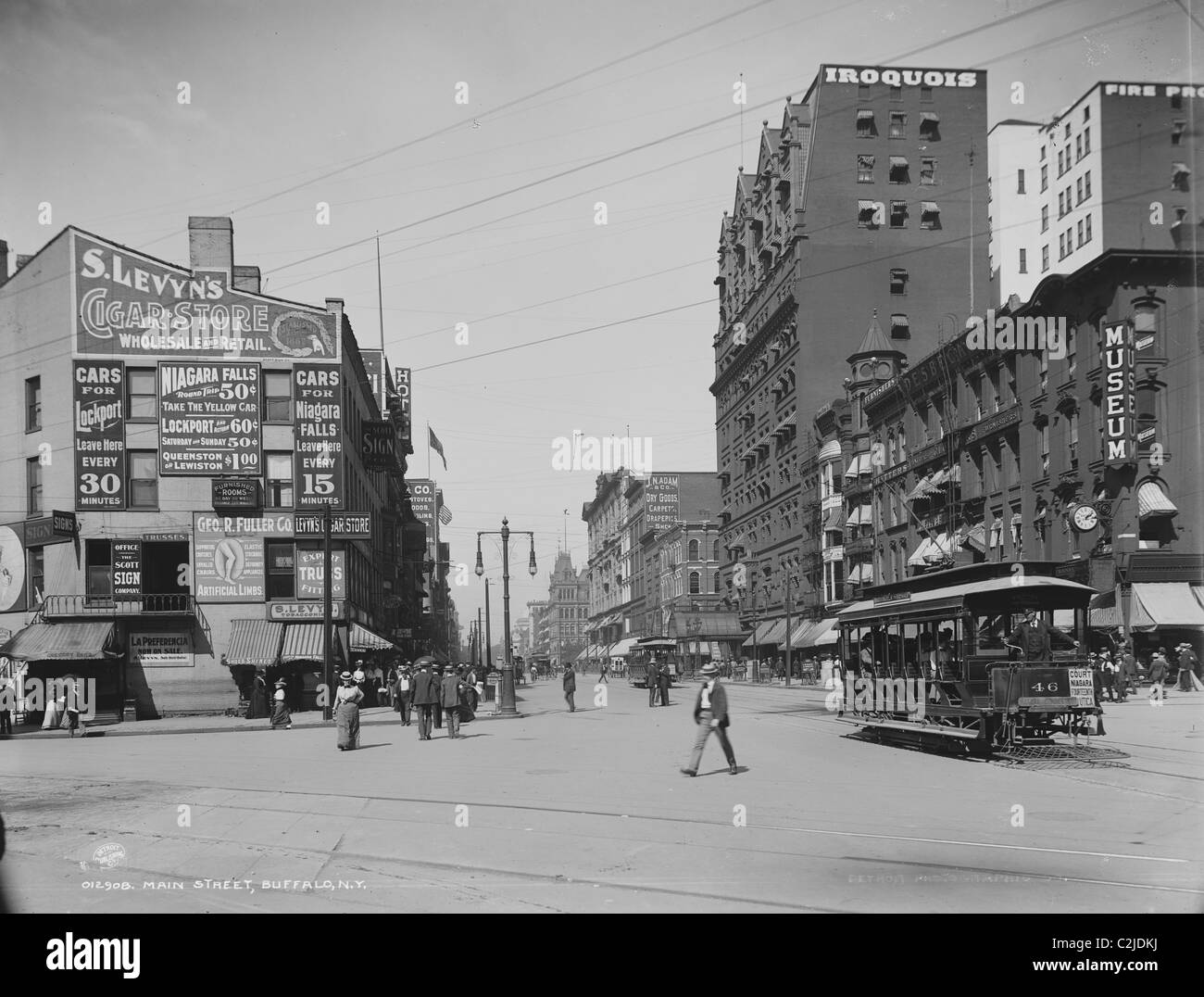 Trolleys & Pedestrians on Main Street in Buffalo, New York Stock Photo ...