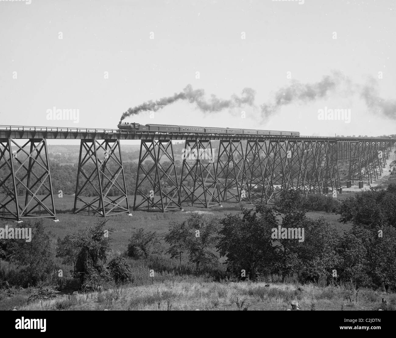 Steam Train passes over Valley Trestle Bridge Stock Photo - Alamy
