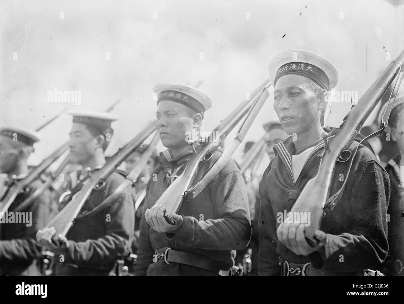Chinese Sailors at Shoulder Arms march four abreast Stock Photo - Alamy