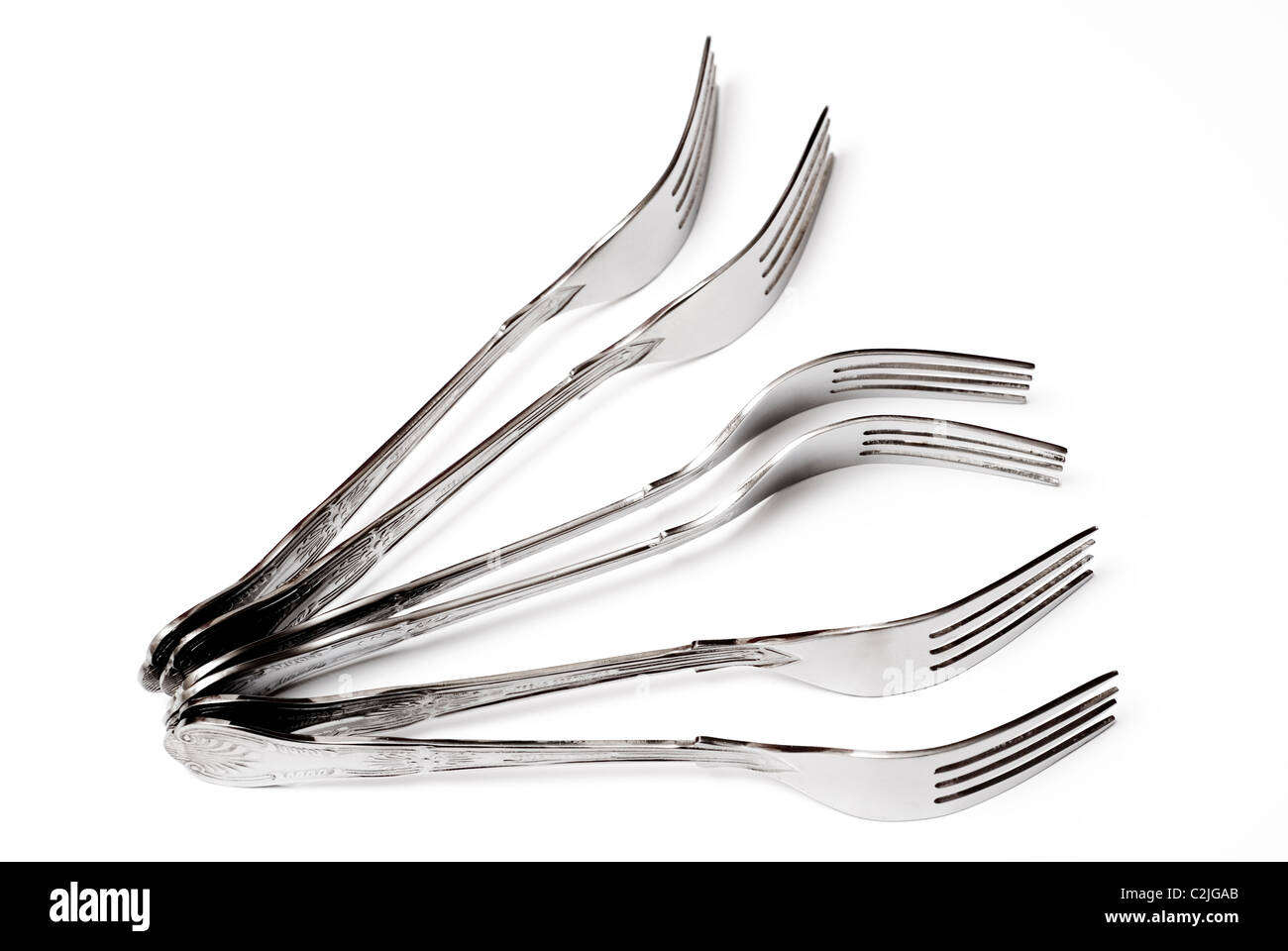 Six eating forks isolated on a white background Stock Photo - Alamy