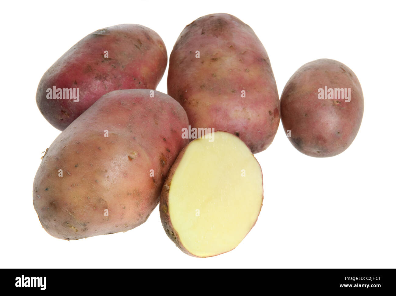Five potatoes isolated on a white background Stock Photo - Alamy
