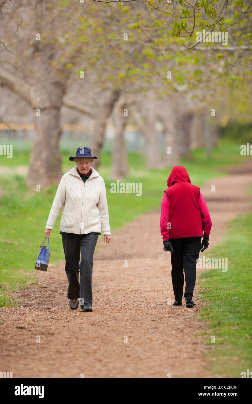 Senior citizen woman walking on spring day-Victoria, British Columbia ...