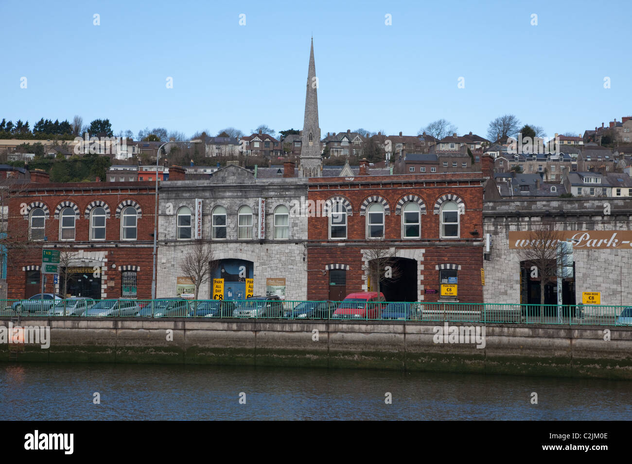 view of buildings across river in county cork Stock Photo - Alamy