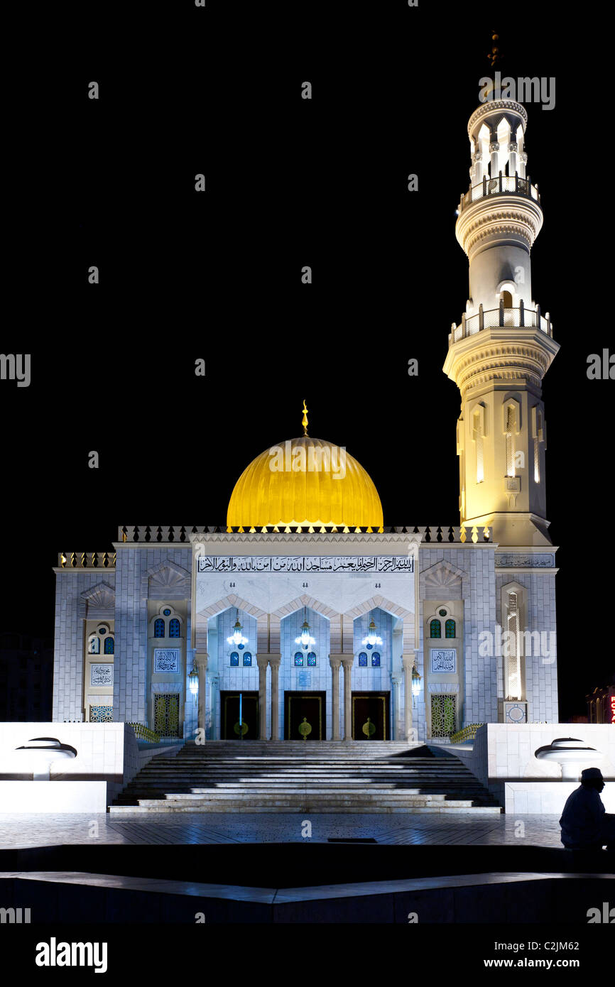 A mosque illuminated at night in the city of Muscat, Oman Stock Photo ...