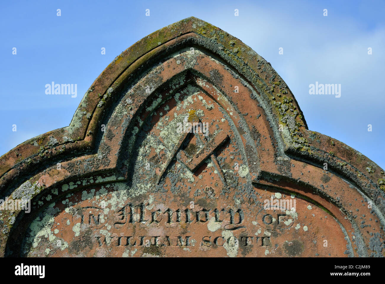 Detail of gravestone with Masonic square and compasses symbols. Church ...