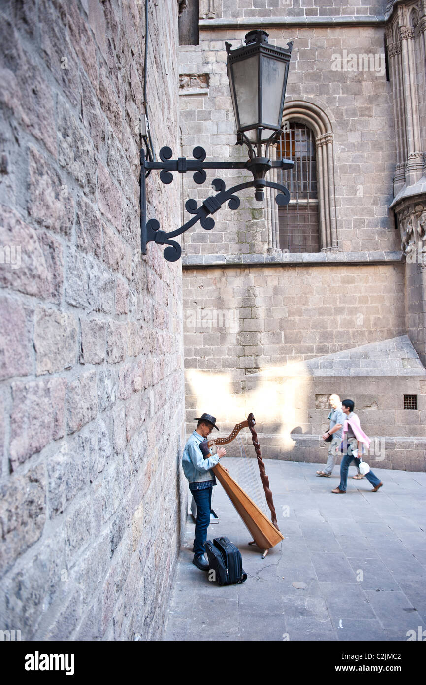 Harp Player performing in the streets of the Gothic area of Barcelona ...