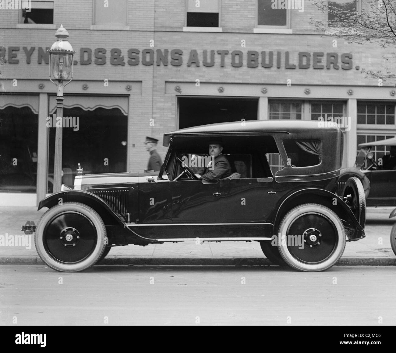 Automobile outside Reynolds & Sons Auto builders Stock Photo - Alamy